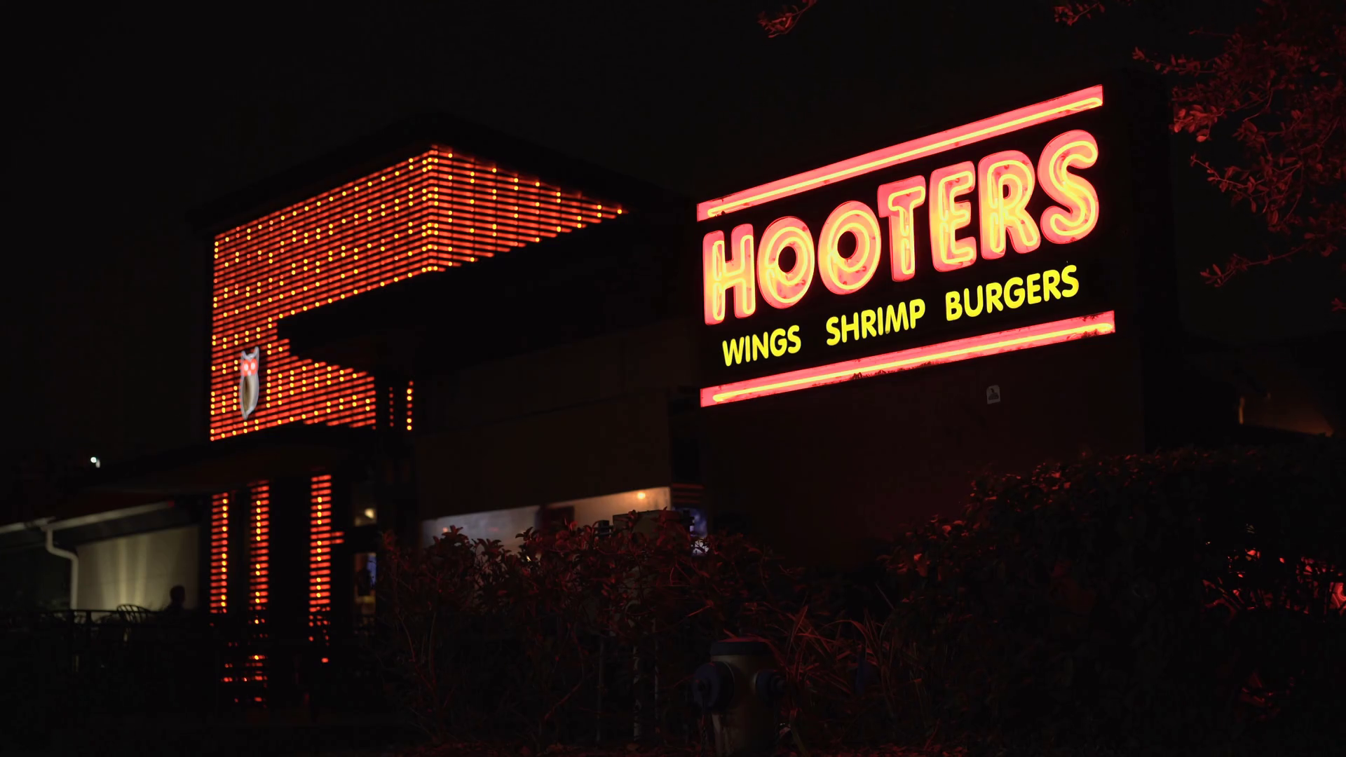 Hooters Restaurant Exterior At Night Orlando Stock Footage SBV ...