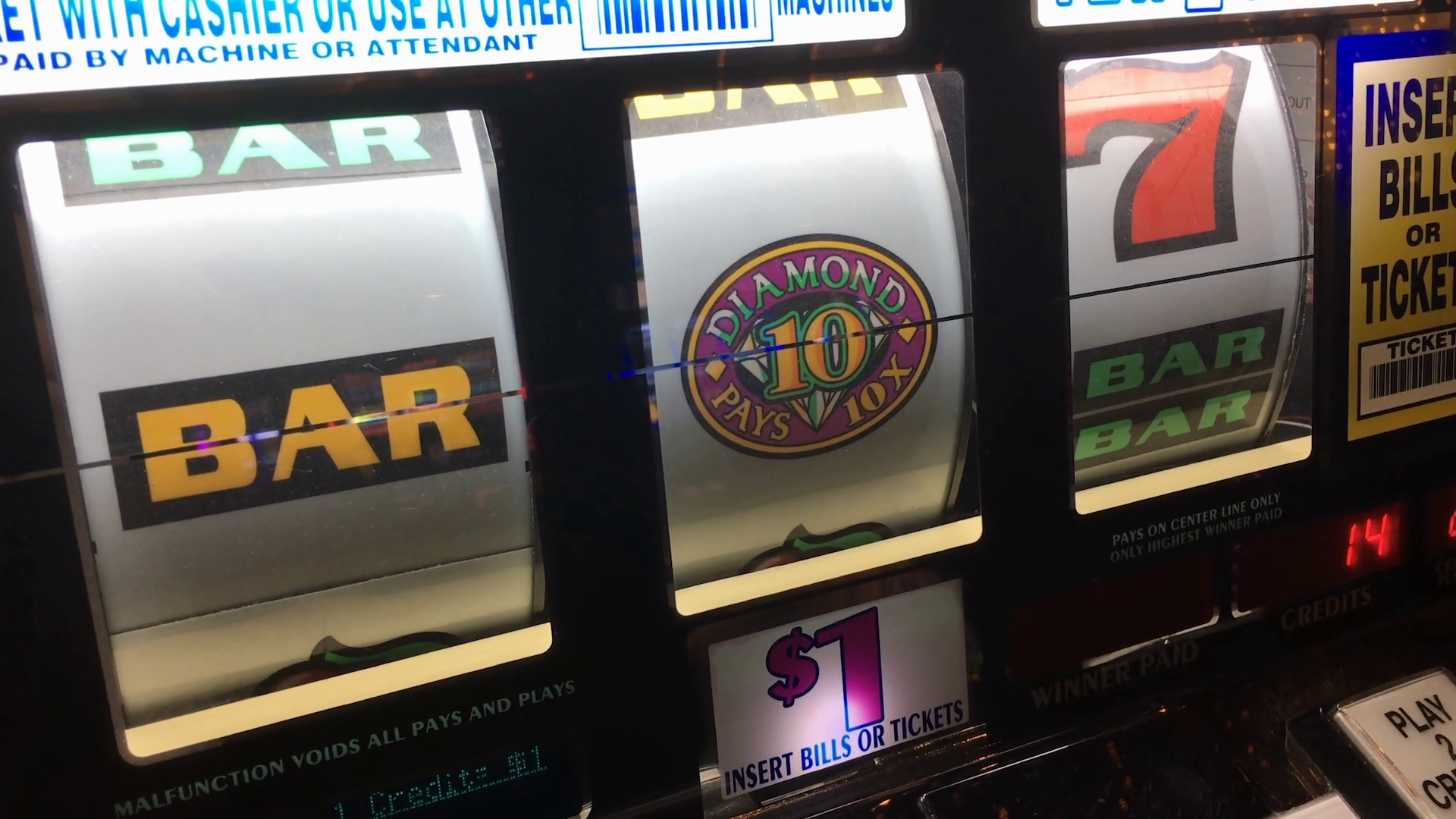 Playing Dollar Slot Machine At Casino Stock Footage SBV-331412205 ...