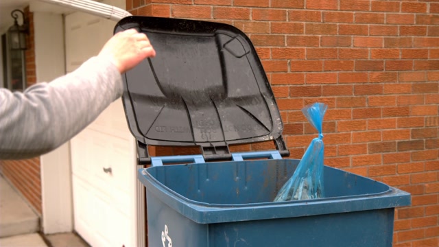 Throwing Away Trash Into Bin Stock Footage: Royalty-Free Video Clips ...