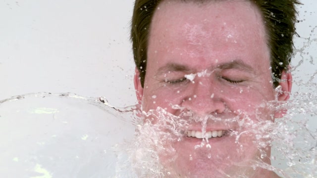 Water Splash On Face Stock Footage: Royalty-Free Video Clips - Storyblocks