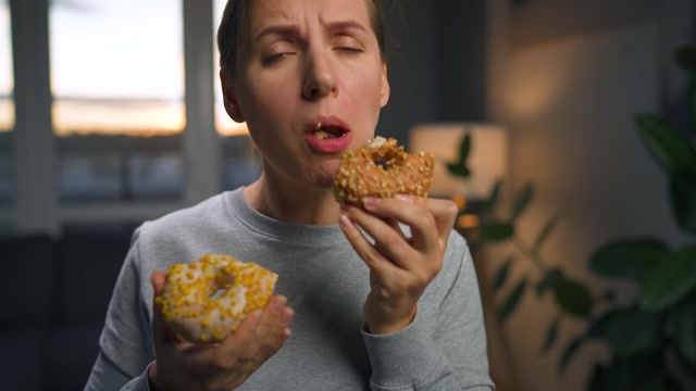 Binge Eating Stock Footage: Royalty-Free Video Clips - Storyblocks