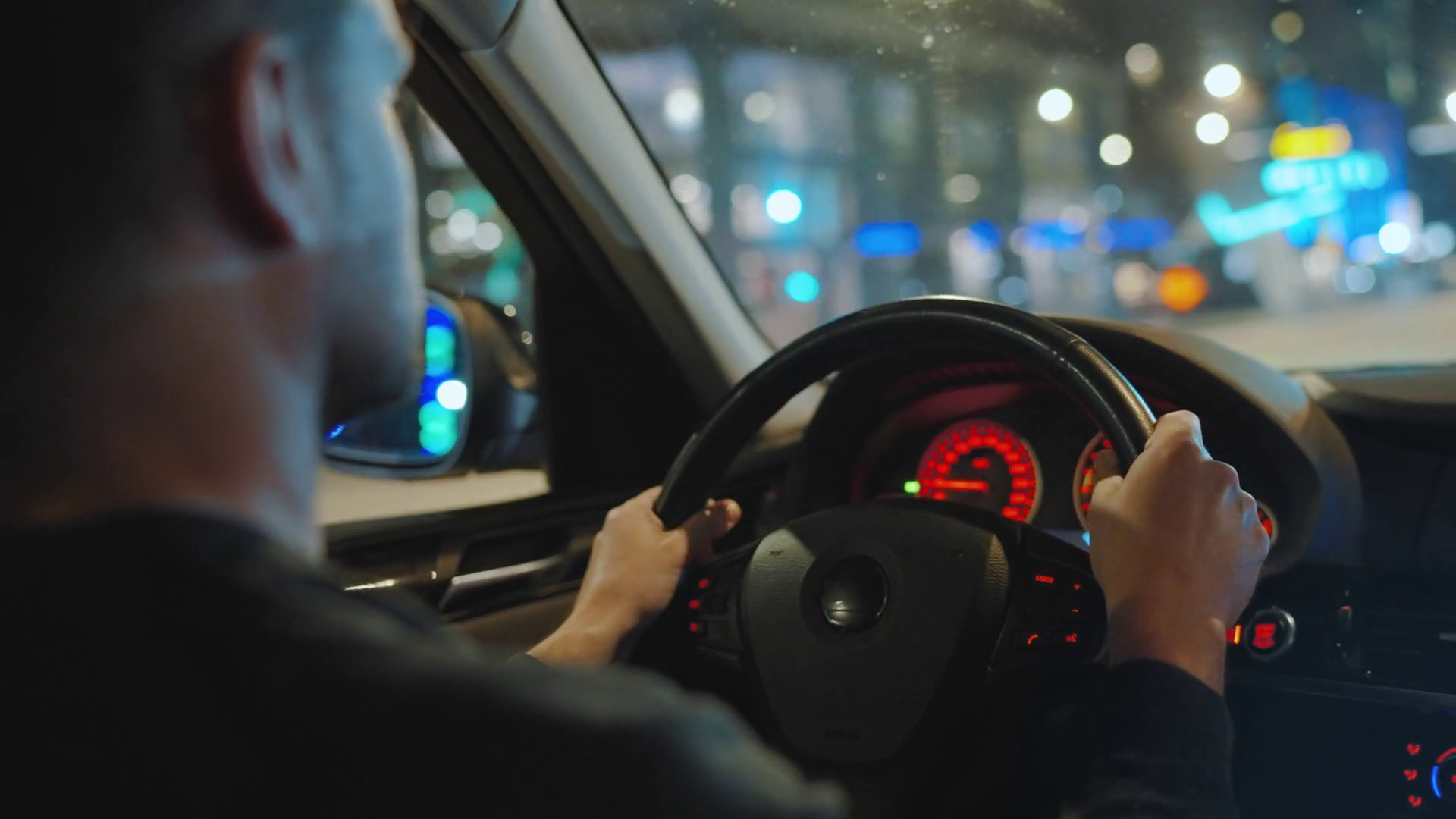 Man Driving Car Through Streets Of Night City Stock Footage SBV ...