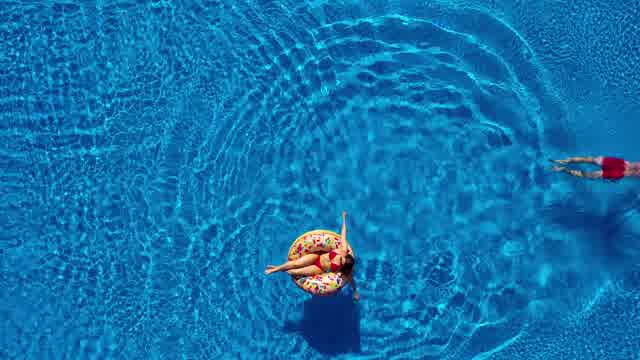 Person Floating In Water Relaxed Aerial View Stock Footage: Royalty ...
