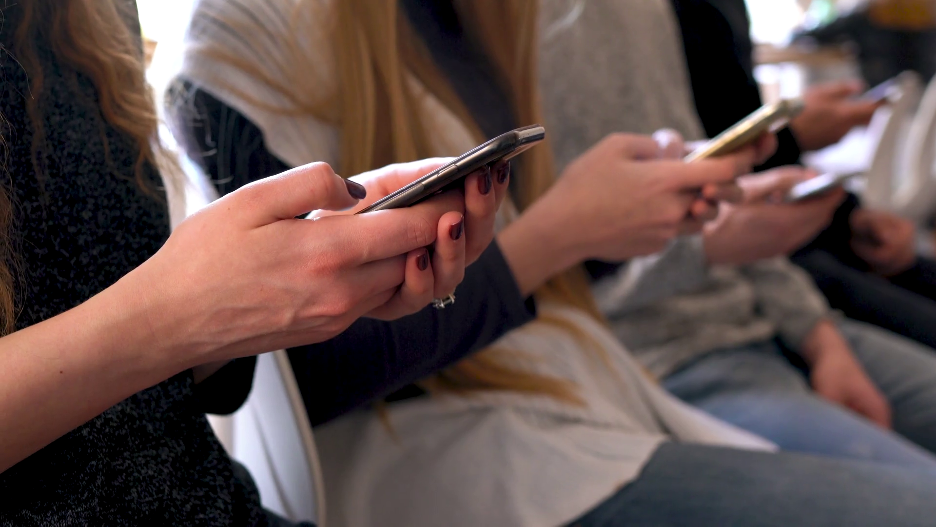 Group of people use mobile phones in a cafe instead of communicating ...