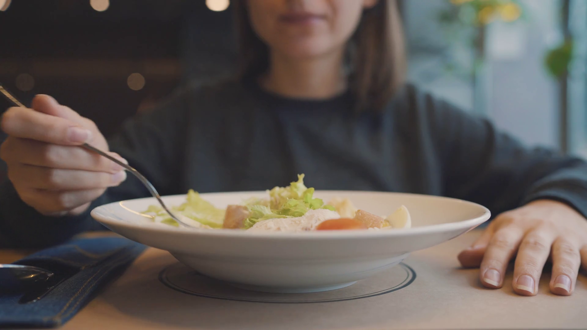 Woman Eating Caesar Salad In Cafe Stock Footage SBV-320427208 - Storyblocks
