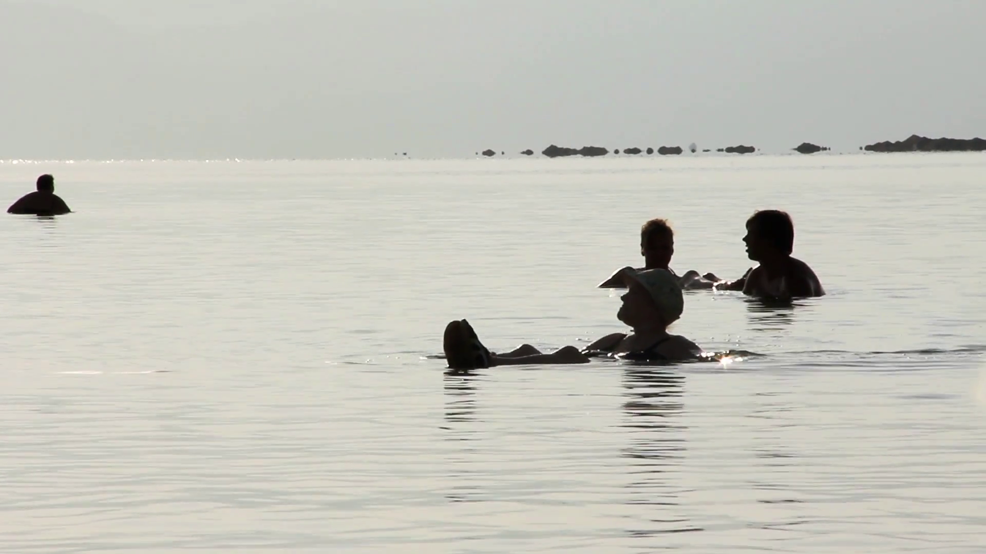 People Bathe In Dead Sea In Morning Israel Stock Footage SBV-304824234 ...