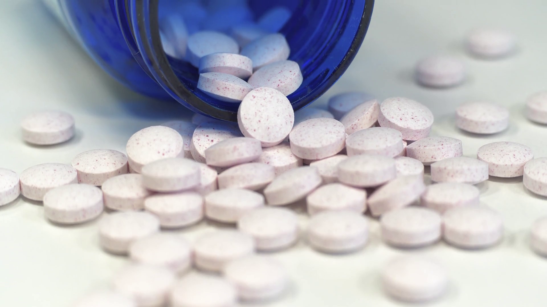 White Pills Blue Jar Lies On Table Overdose Stock Footage SBV-348837015 ...