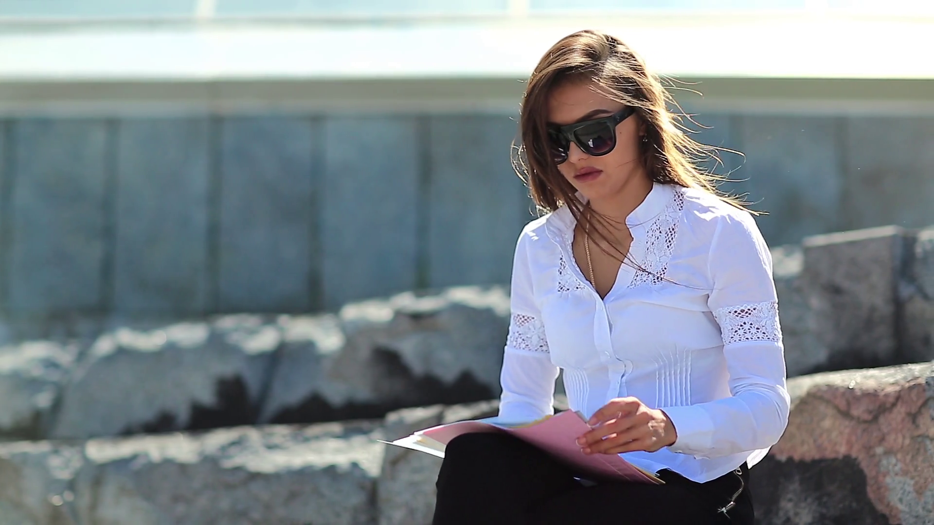 Angry woman with commercial papers Young angry career woman sits on the ...