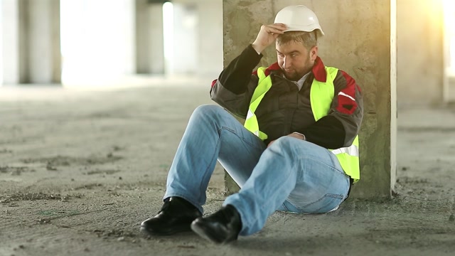 Tired Construction Worker Stock Footage: Royalty-Free Video Clips ...