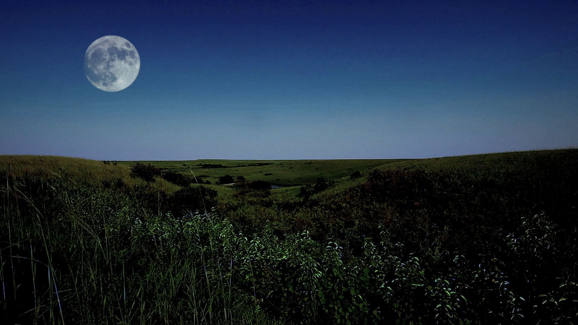 The Full Moon Rises Above Hilly Prairie Stock Footage SBV-310763356 ...