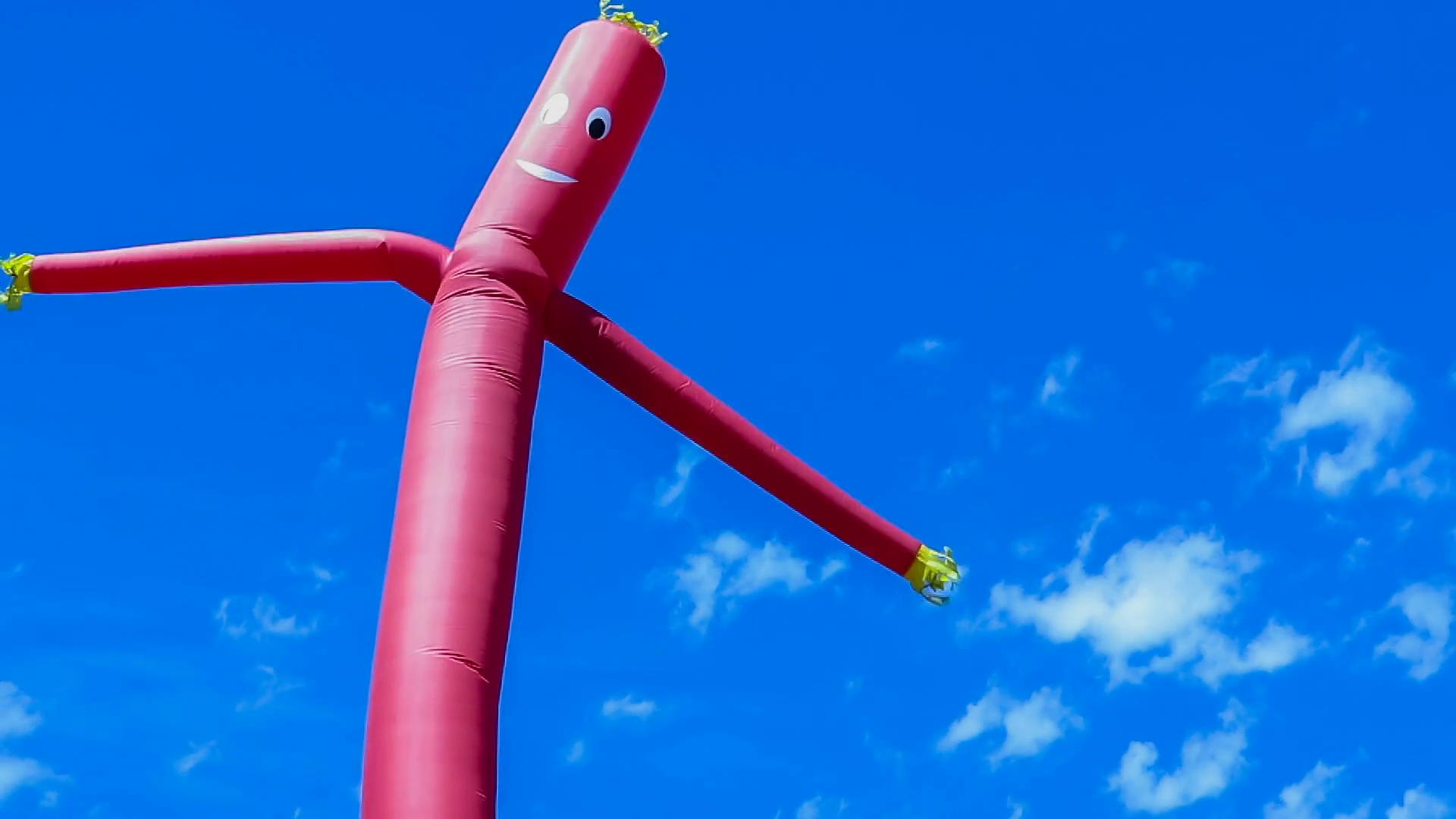 Red air dancer dancing against a blue sky Stock Video Footage - Storyblocks