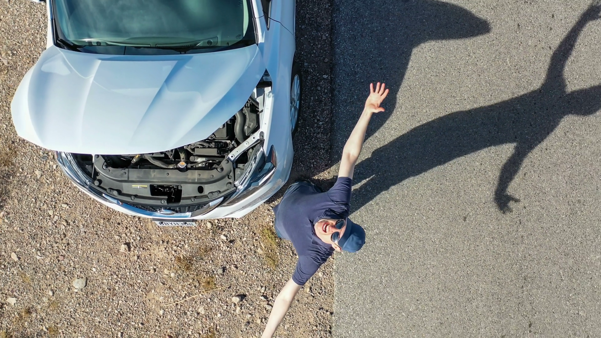 4k video clip of a motorist stranded by the side of the road in the ...