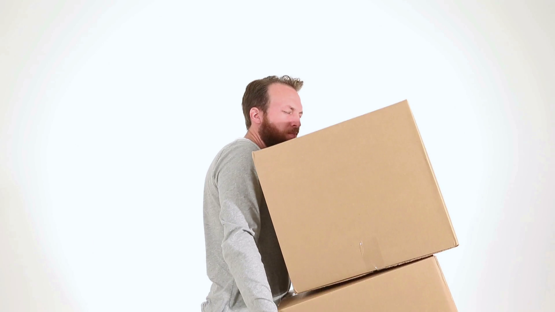 Adult male lifting heavy boxes with severe back pain Stock Video ...