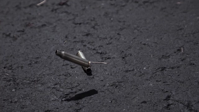 Falling Bullet Shells Stock Footage: Royalty-Free Video Clips - Storyblocks