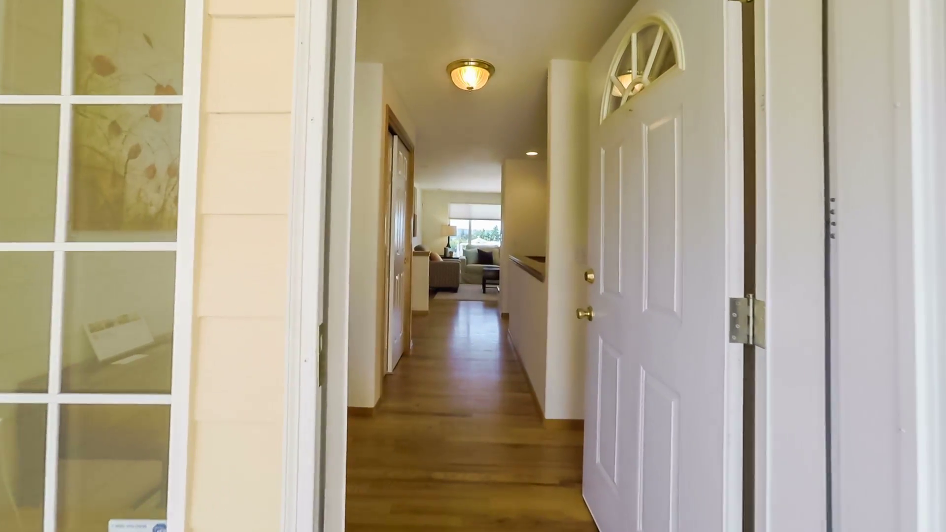 Walking through a modern American suburban home, entering through the ...