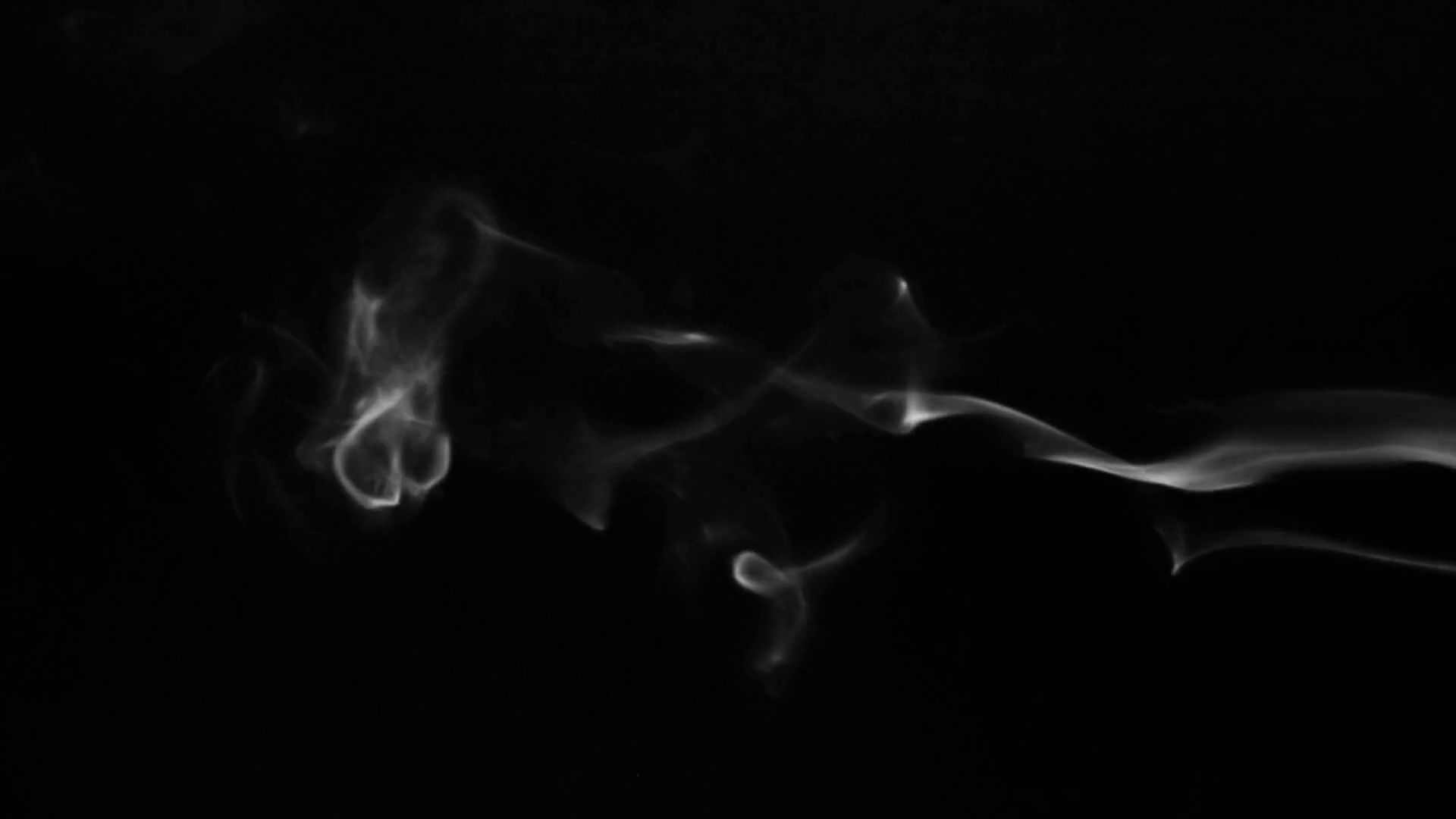 Wispy white smoke traveling horizontally across frame Stock Video ...