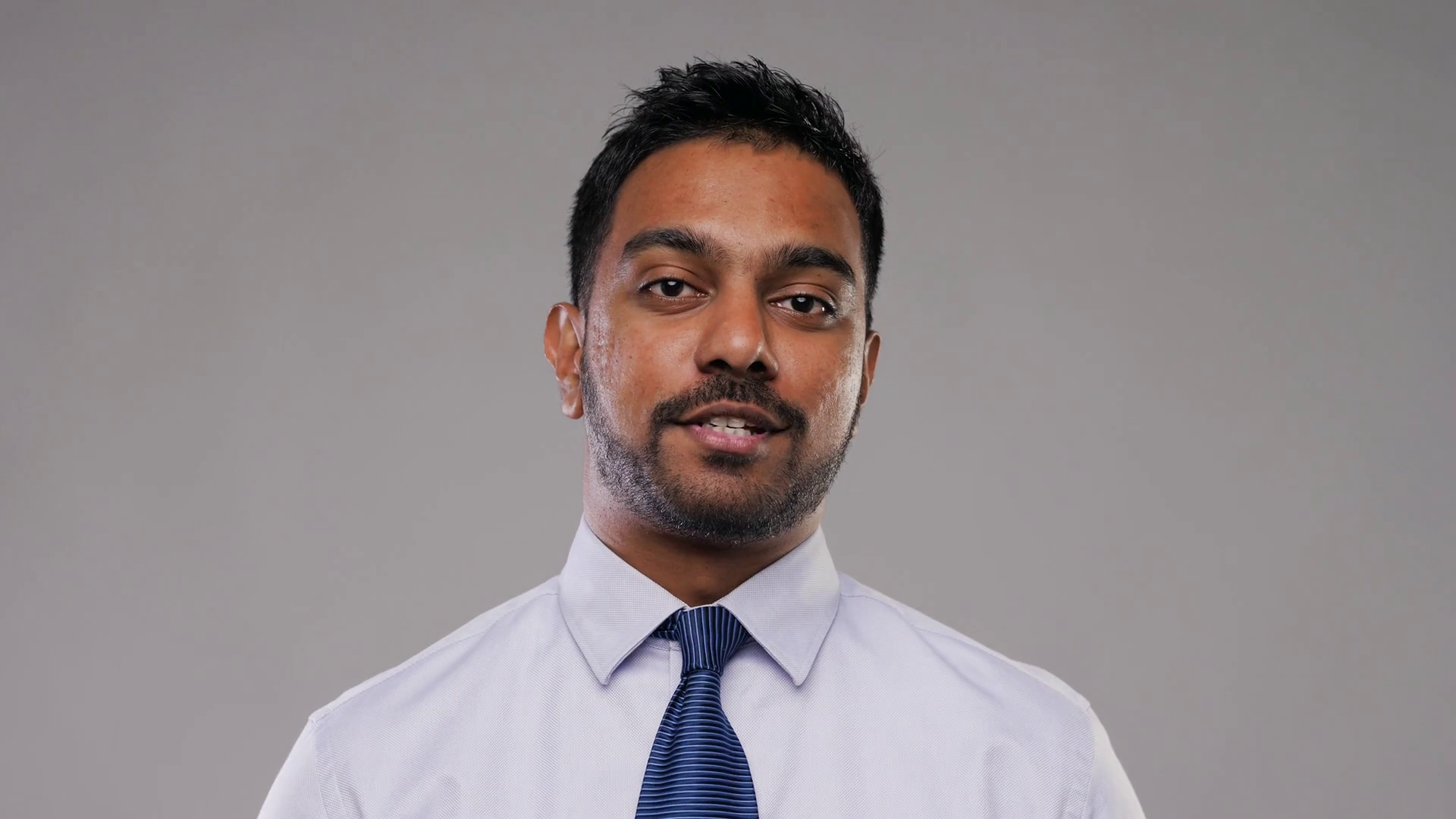 business, communication and people concept - indian businessman having ...