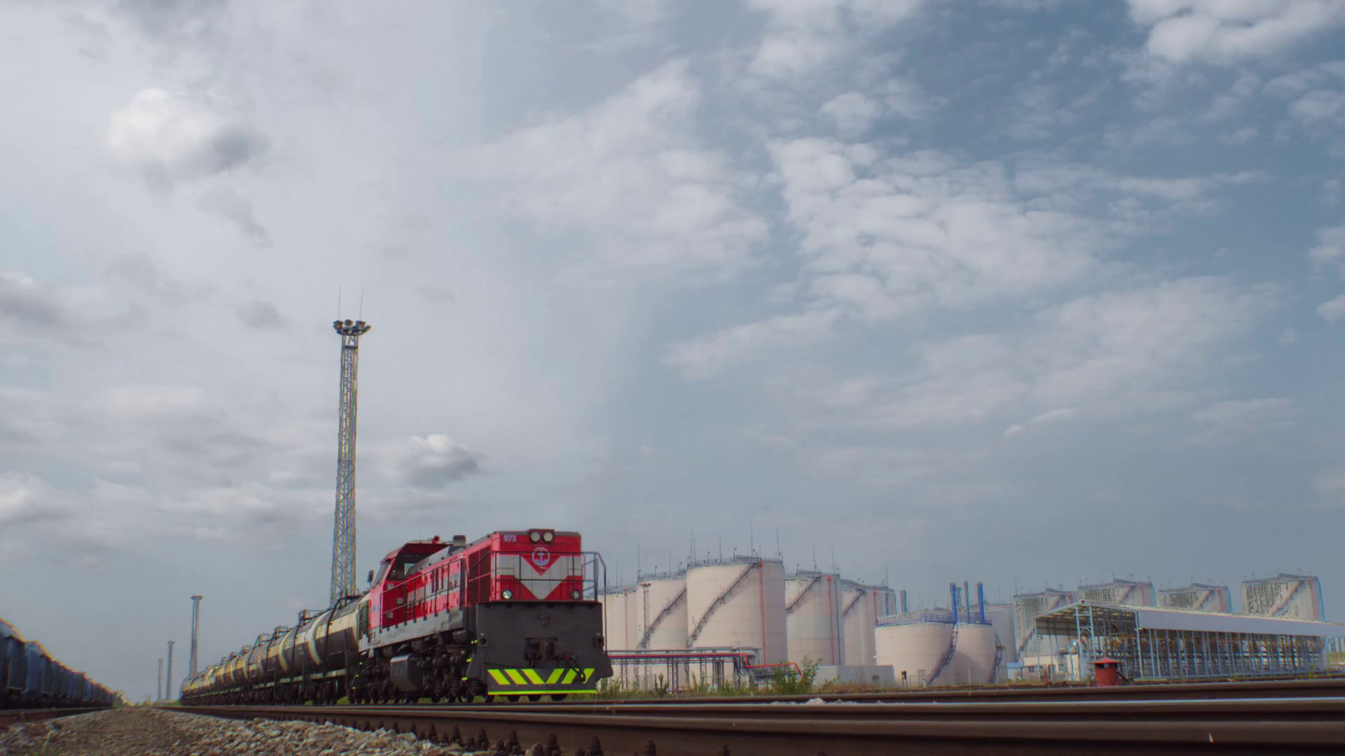 A Freight Train Is Passing Oil Refinery Stock Footage SBV-331031299 ...