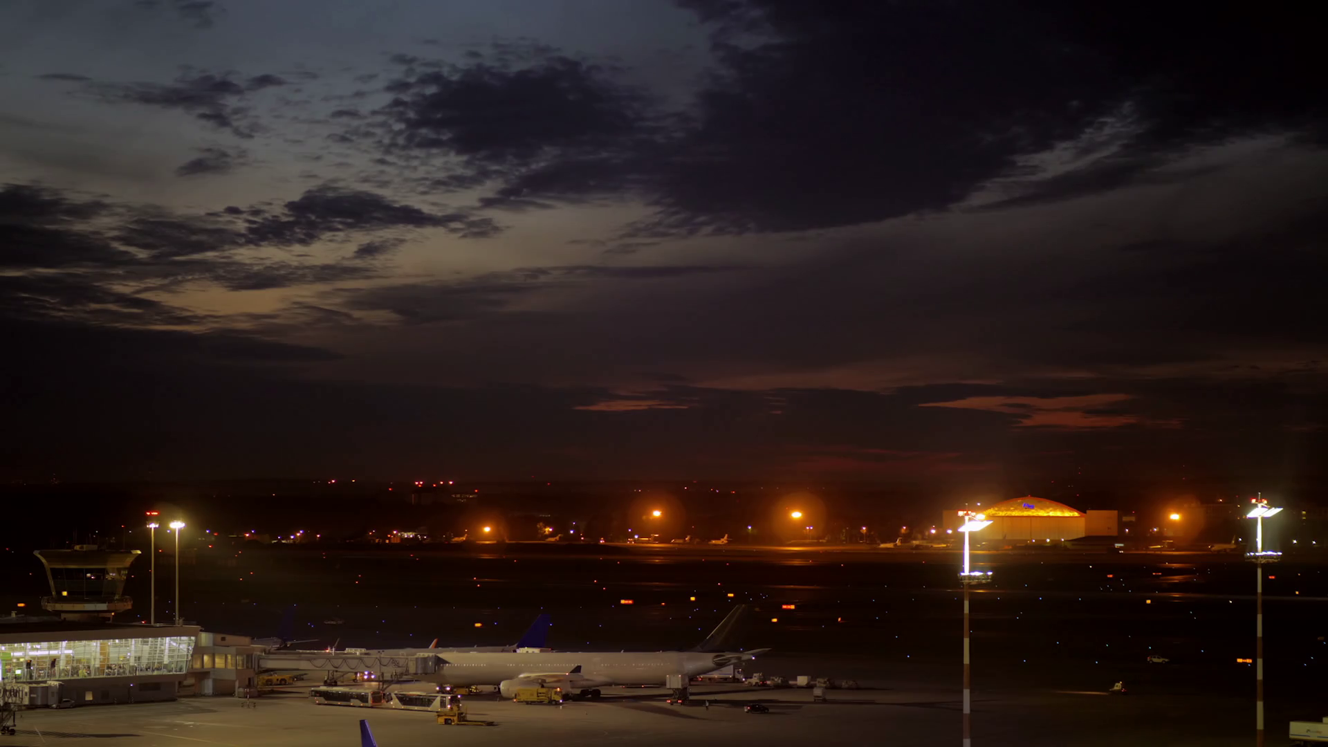 HD version - Night view of the airport with terminal, plane with jet ...