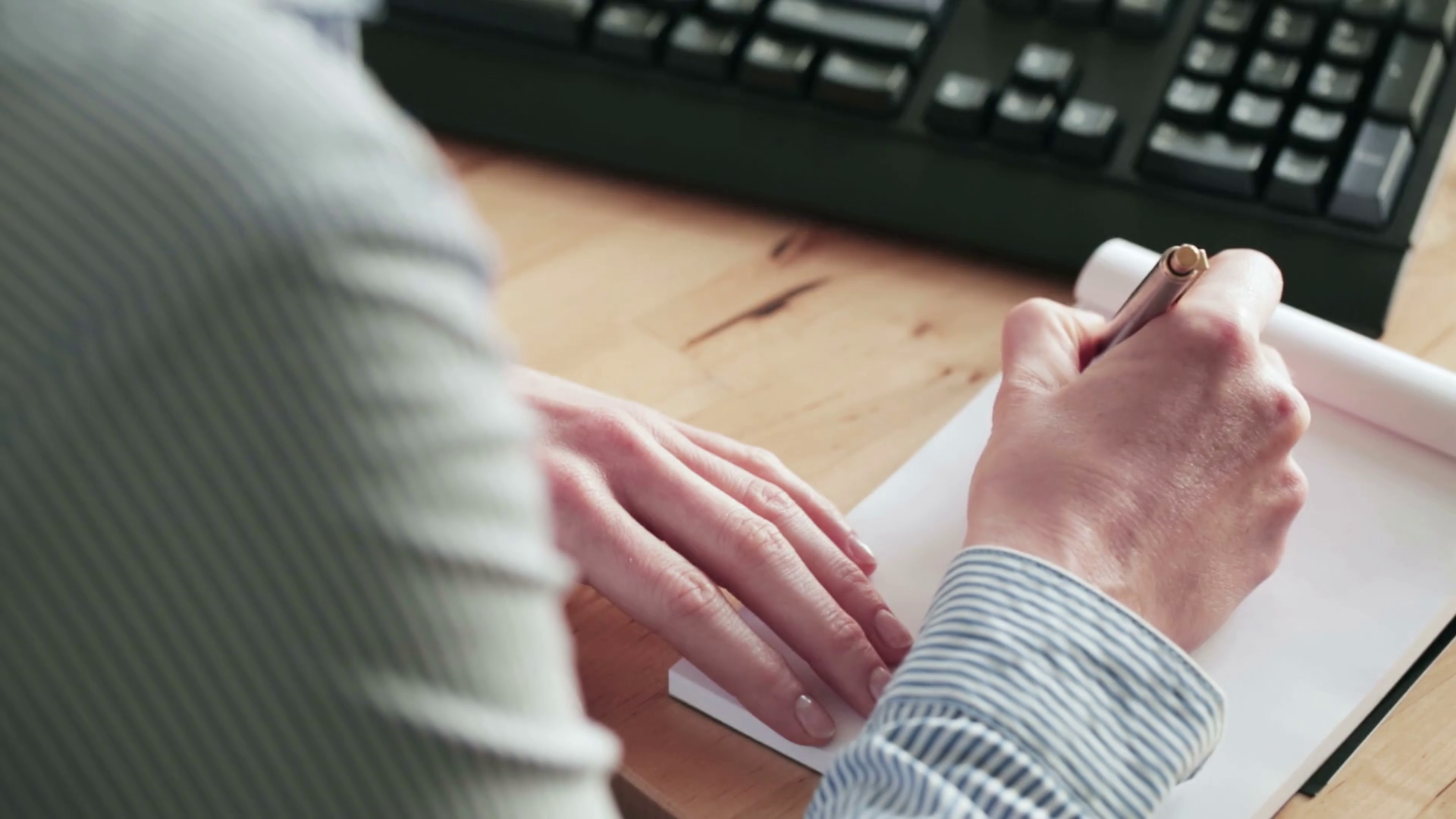 A Business Woman At Workplace Takes Notes On Stock Footage SBV ...