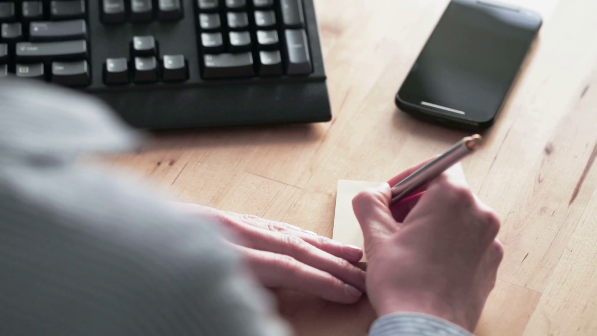A Young Professional Leaves Note On Desk Stock Footage SBV-302583727 ...