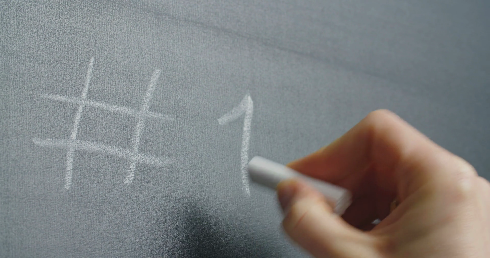 Hand writing #1 (number one) with chalk on a blackboard. Stock Video ...
