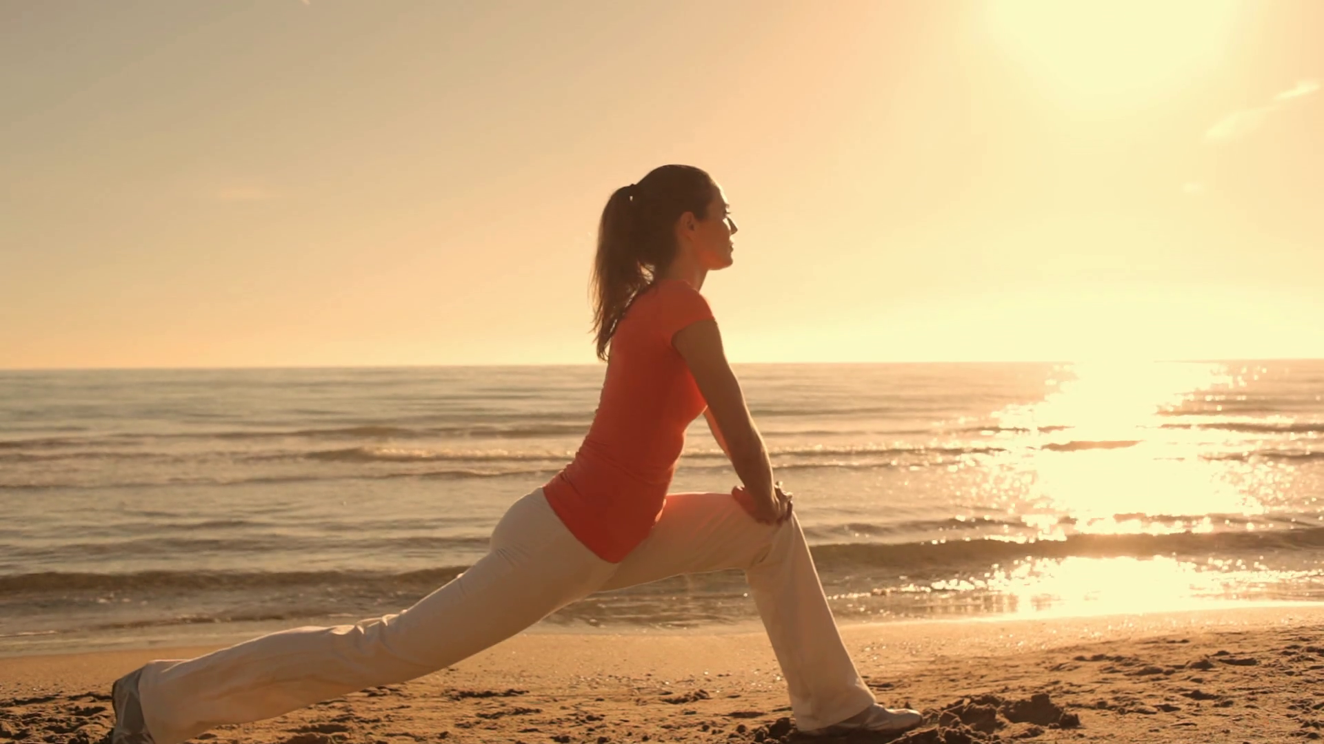 Woman Stretching On Beach In Sunset Stock Footage SBV-300618261 ...