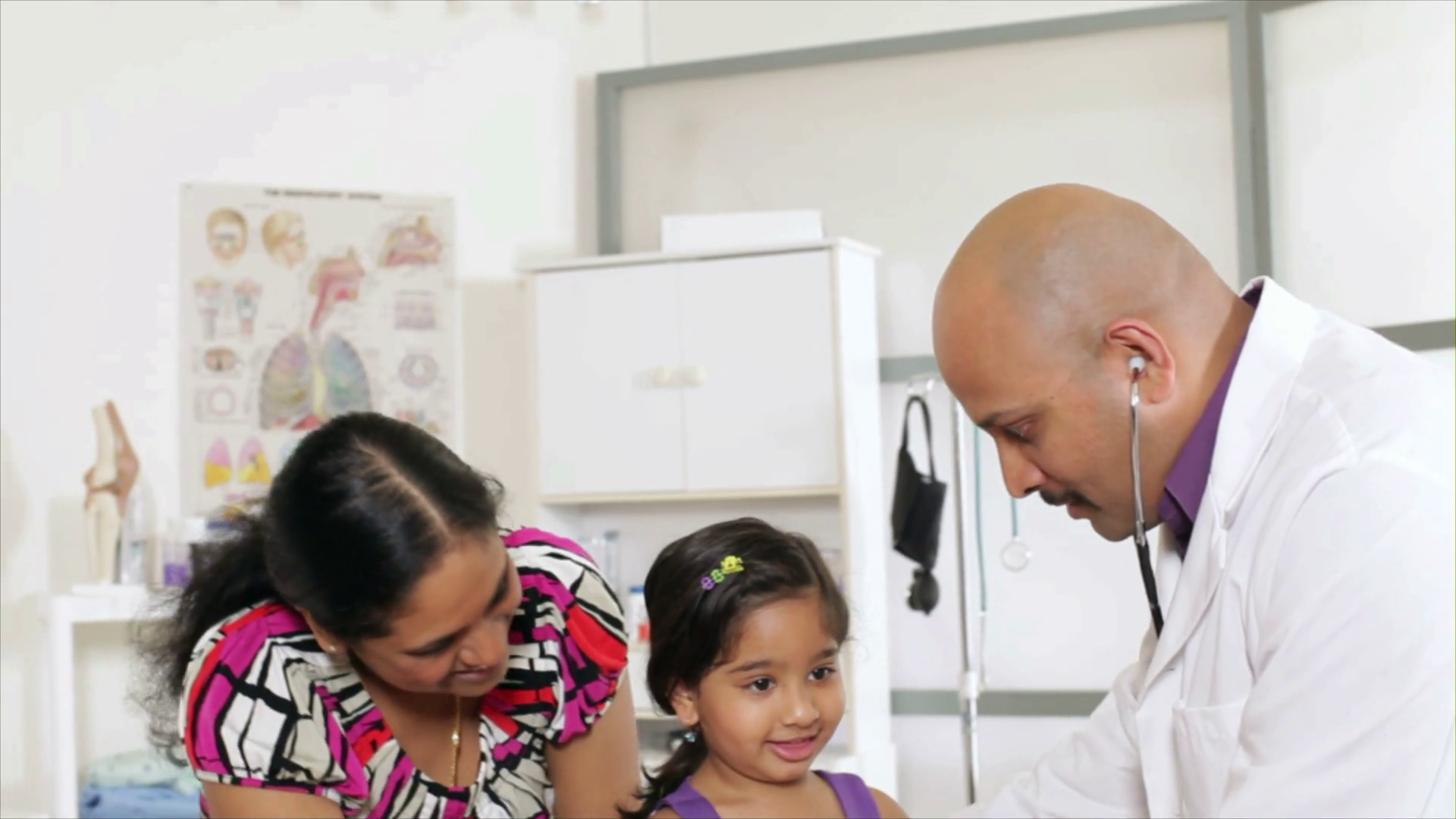 An Indian Doctor Checking Child Stock Footage SBV-300611240 - Storyblocks