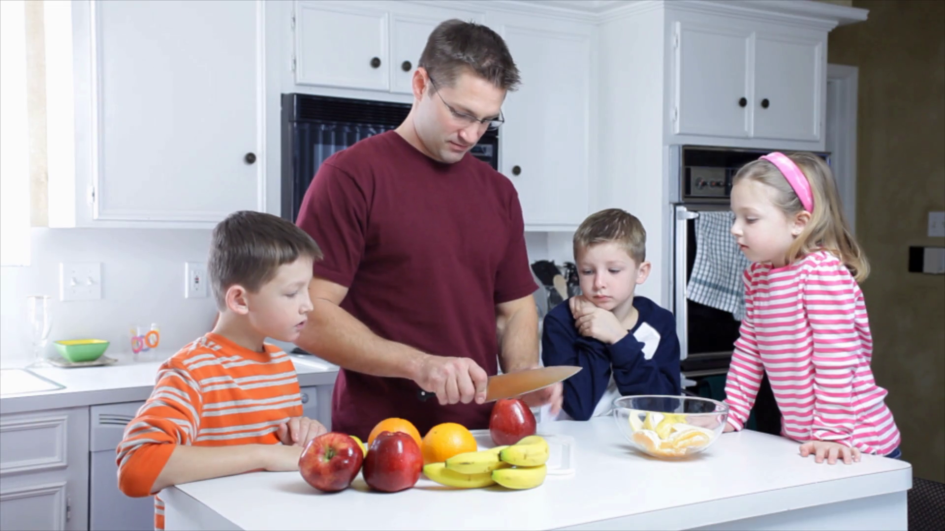 Dad Cutting Fruit With Kids Stock Footage SBV-300970683 - Storyblocks
