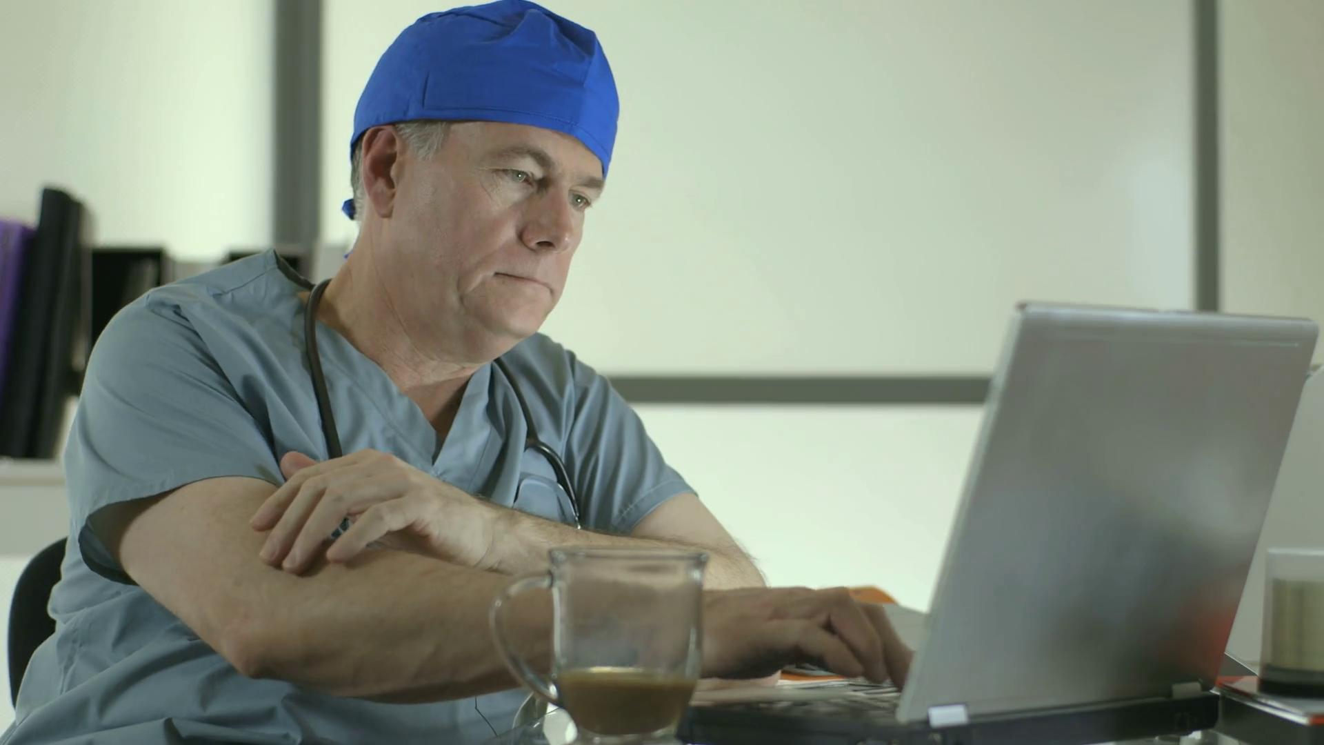 Tired Doctor Drinking Coffee Stock Footage SBV-300610885 - Storyblocks