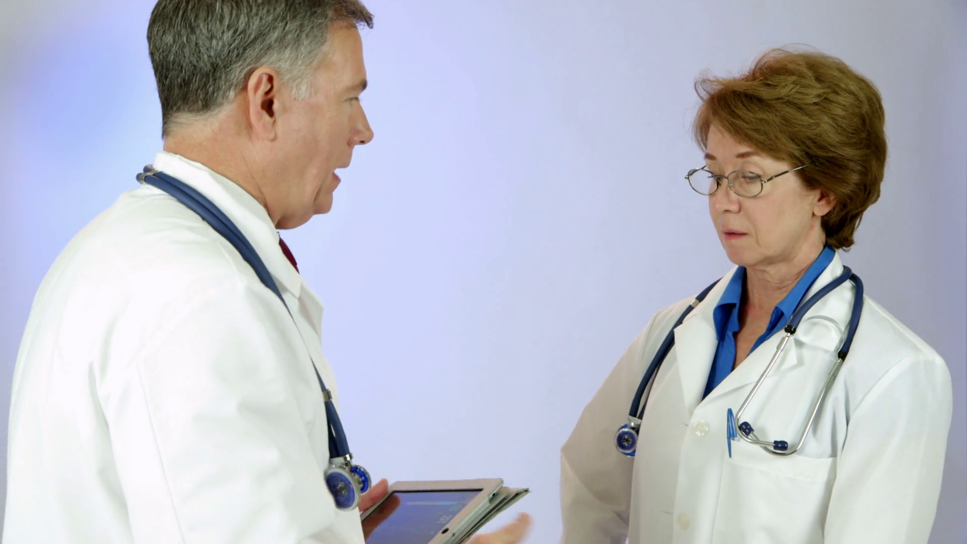 Two Doctors Talking About Patient's Chart Stock Footage SBV-301085611 ...