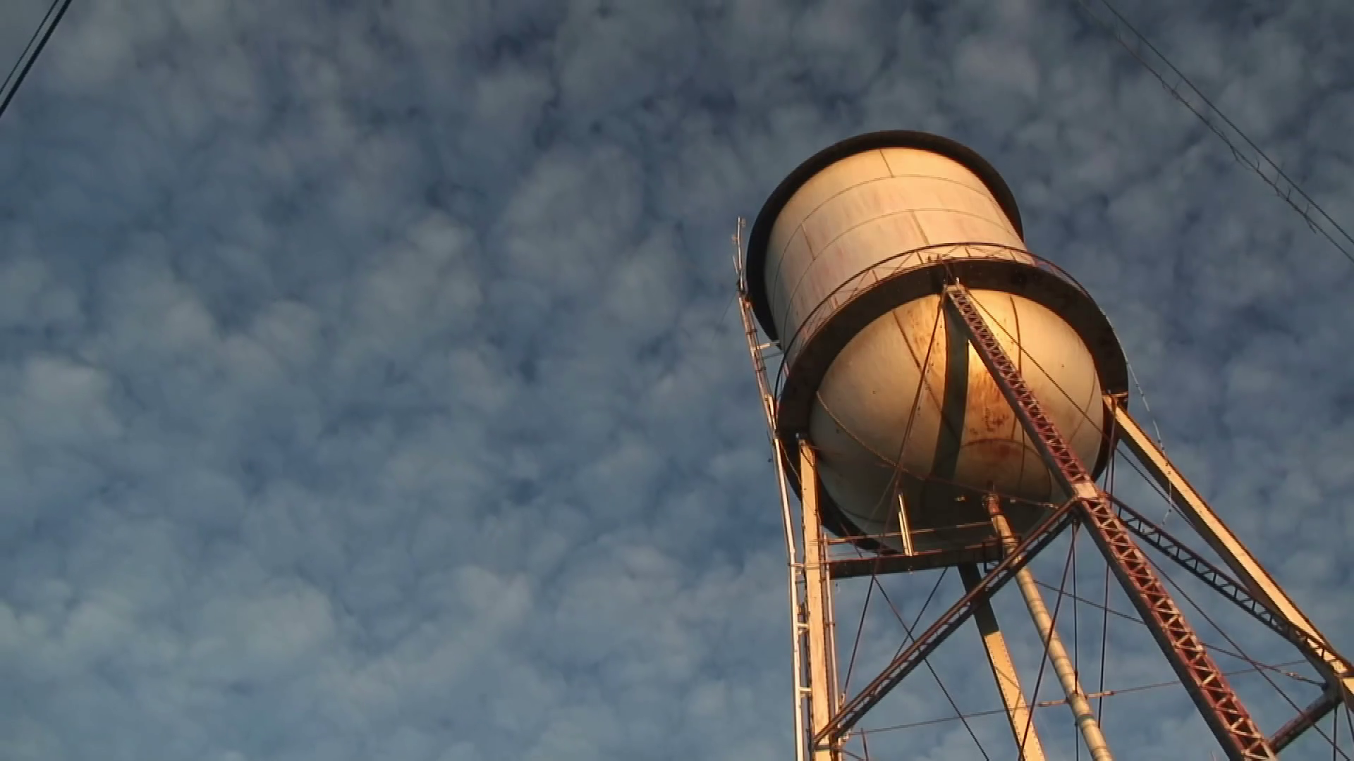 Clouds Moving Past Water Tower Stock Footage SBV-331466976 - Storyblocks