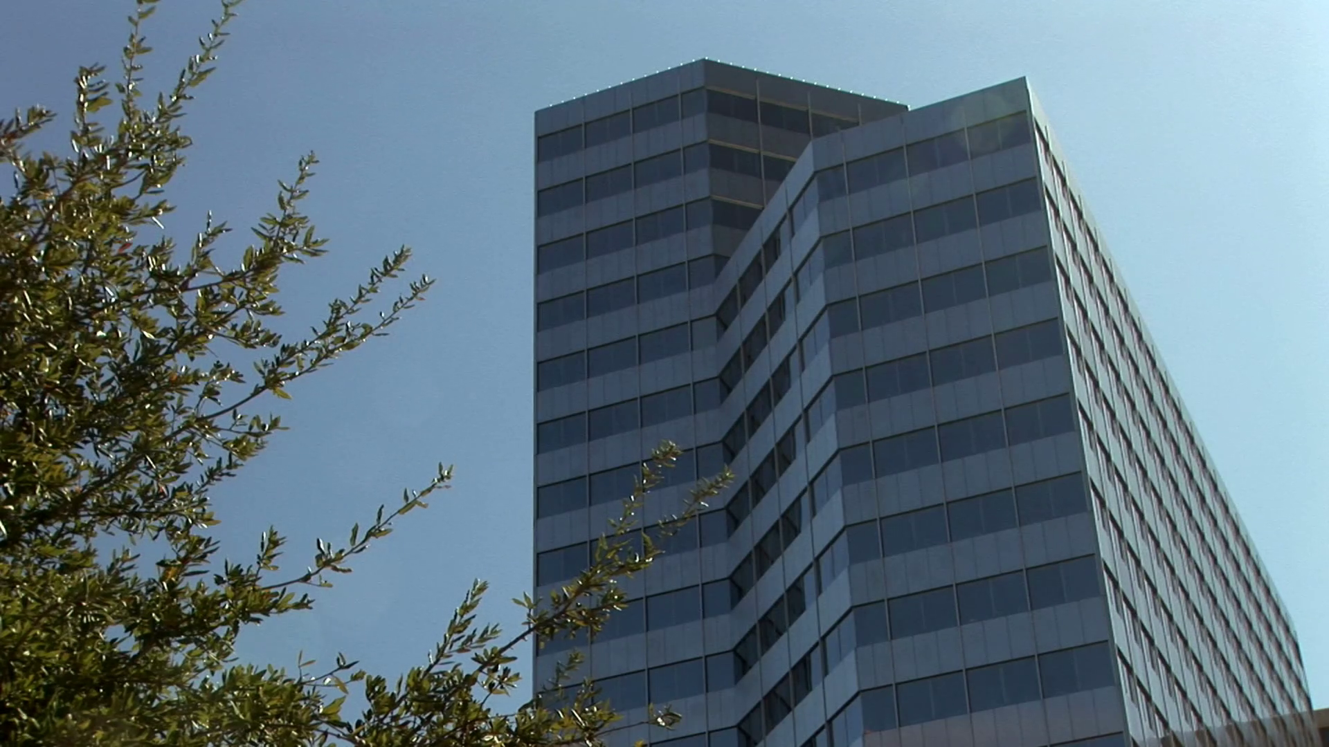 Establishing Shot With Looming High Rise Stock Footage SBV-331470020 ...