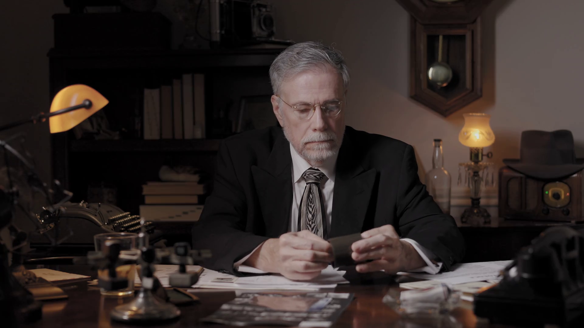 Film Noir Detective Going Over Film Evidence Stock Footage SBV ...