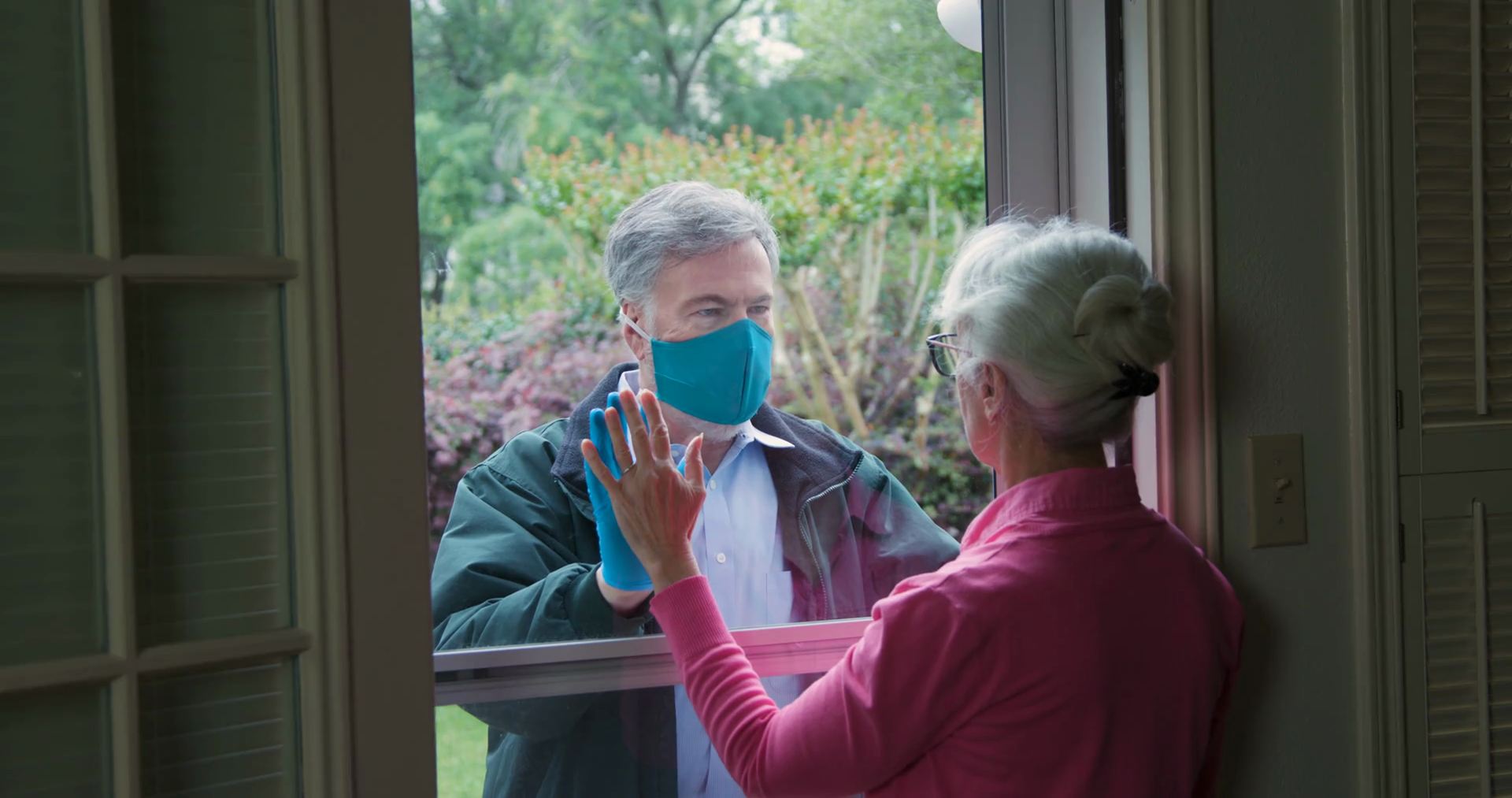 Man Checking On Relative Through Door Window Stock Footage SBV ...