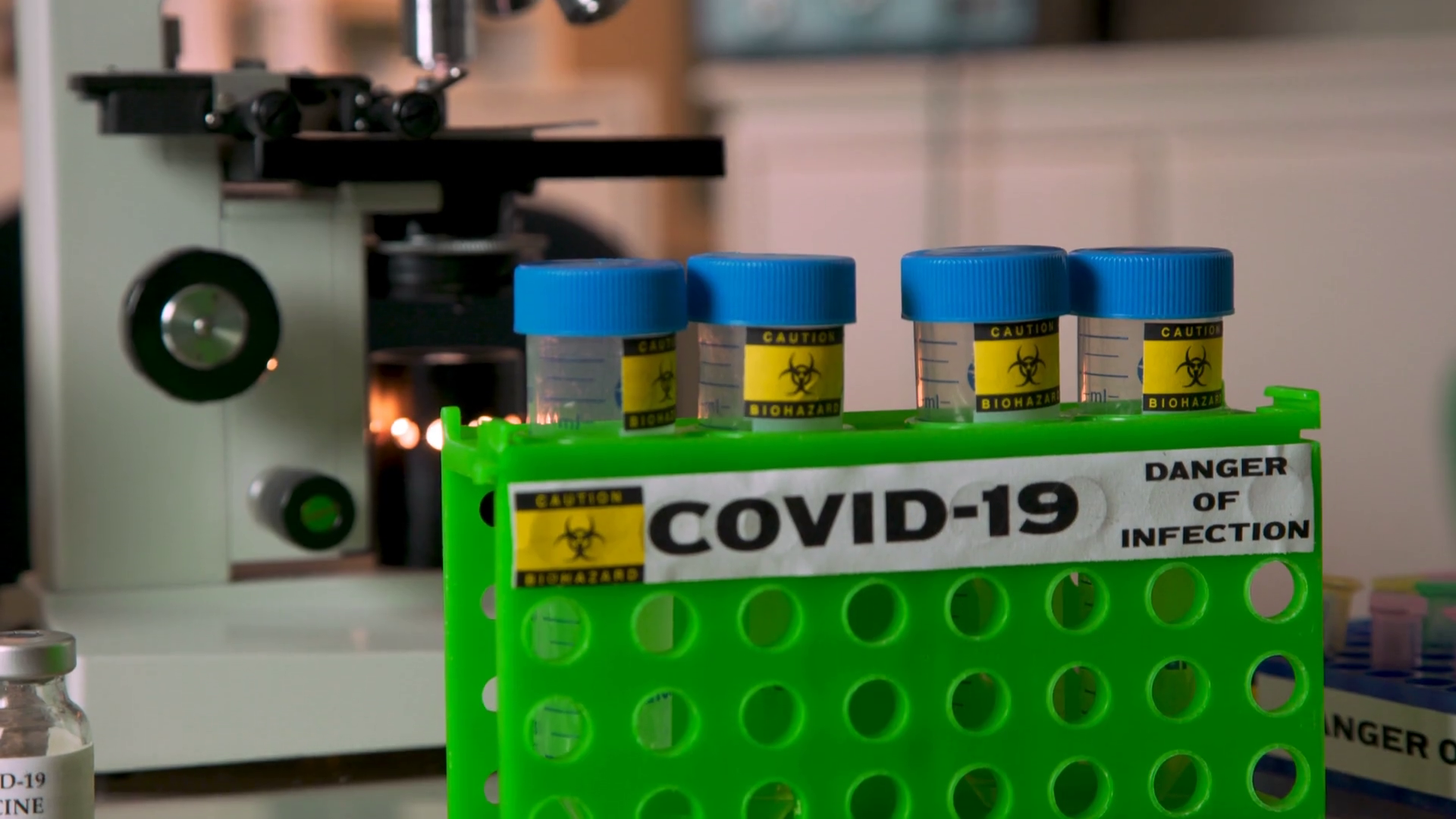Tilt From Vials Of Coronavirus To Model Of Stock Footage SBV-338299443 ...
