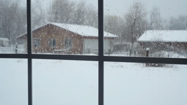 Snow Falling Outside Window Stock Footage: Royalty-Free Video Clips ...