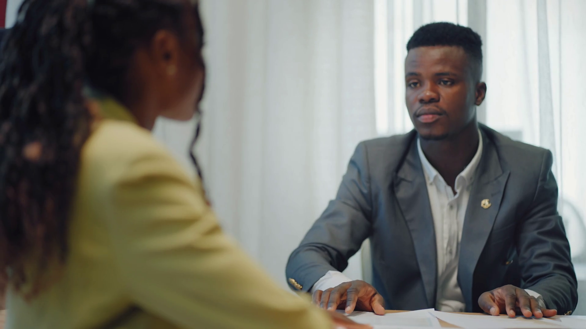 Two successful businessmen black woman and black man wear suits ...