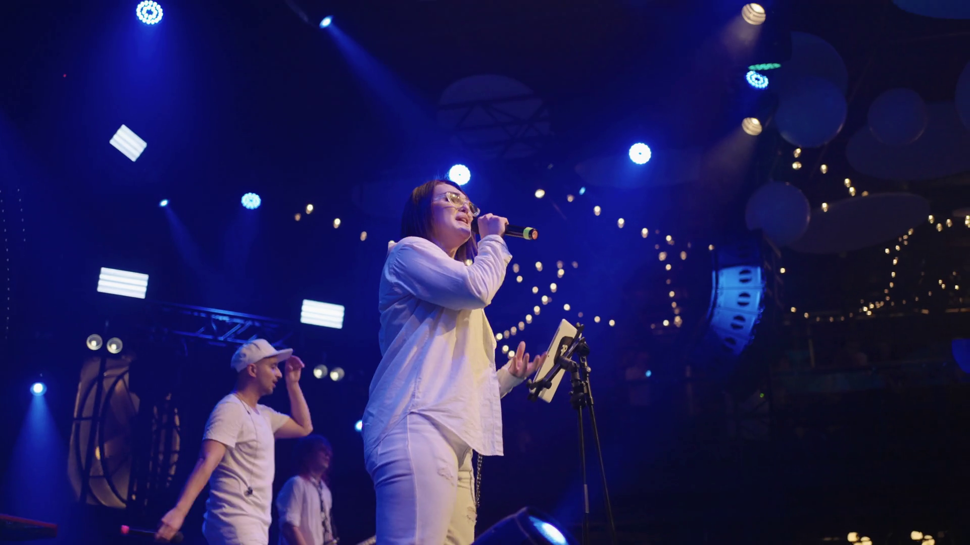 female rapper is rapping and singing on stage, portrait of talented ...