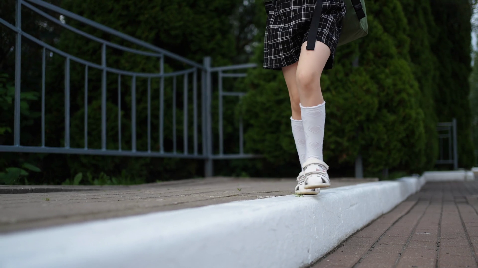 First Grader Girl Walking Over Curb In Park Stock Footage SBV-348468119 ...