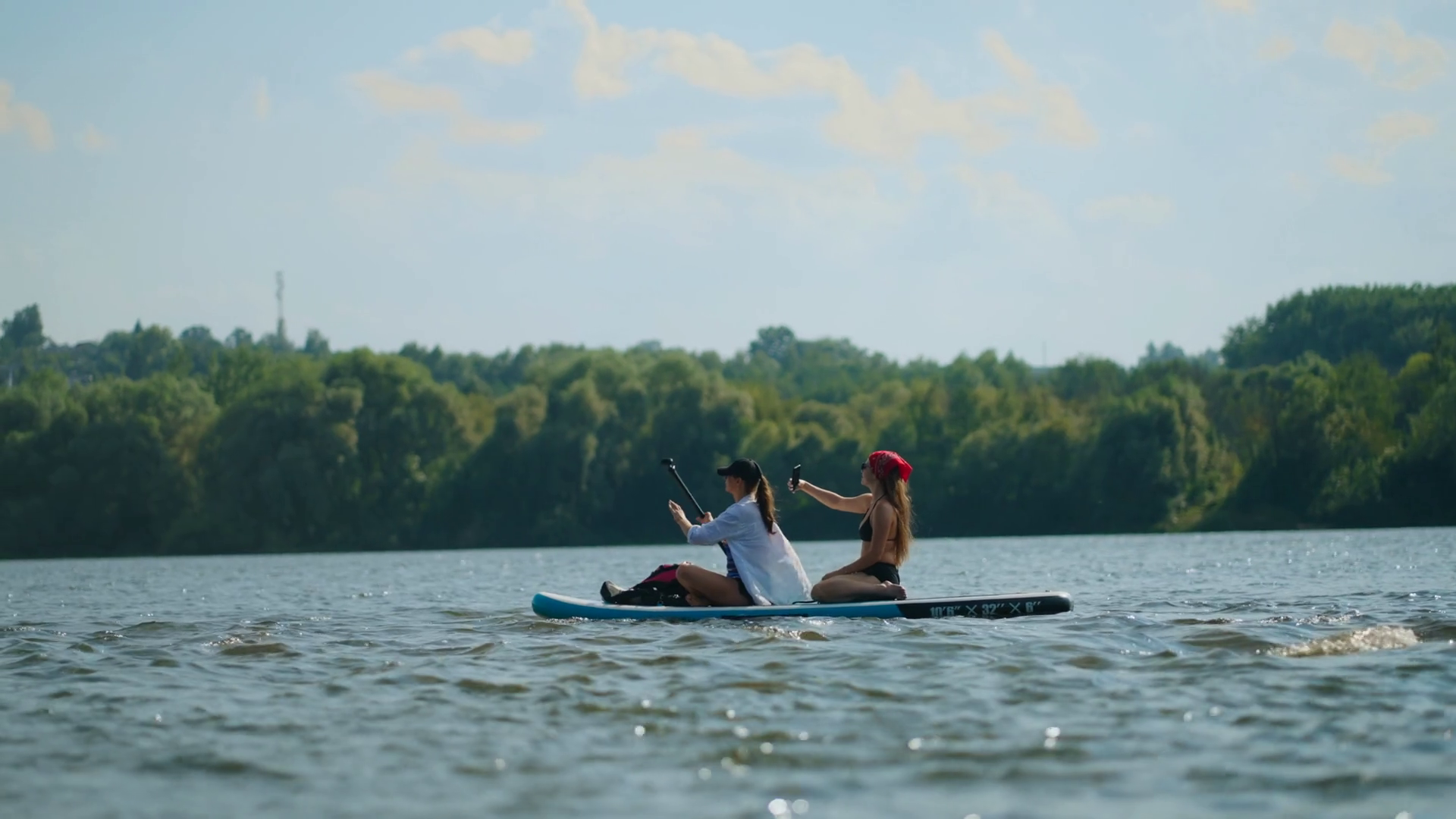 Young Women Tourists Floating On Paddleboard Stock Footage SBV ...