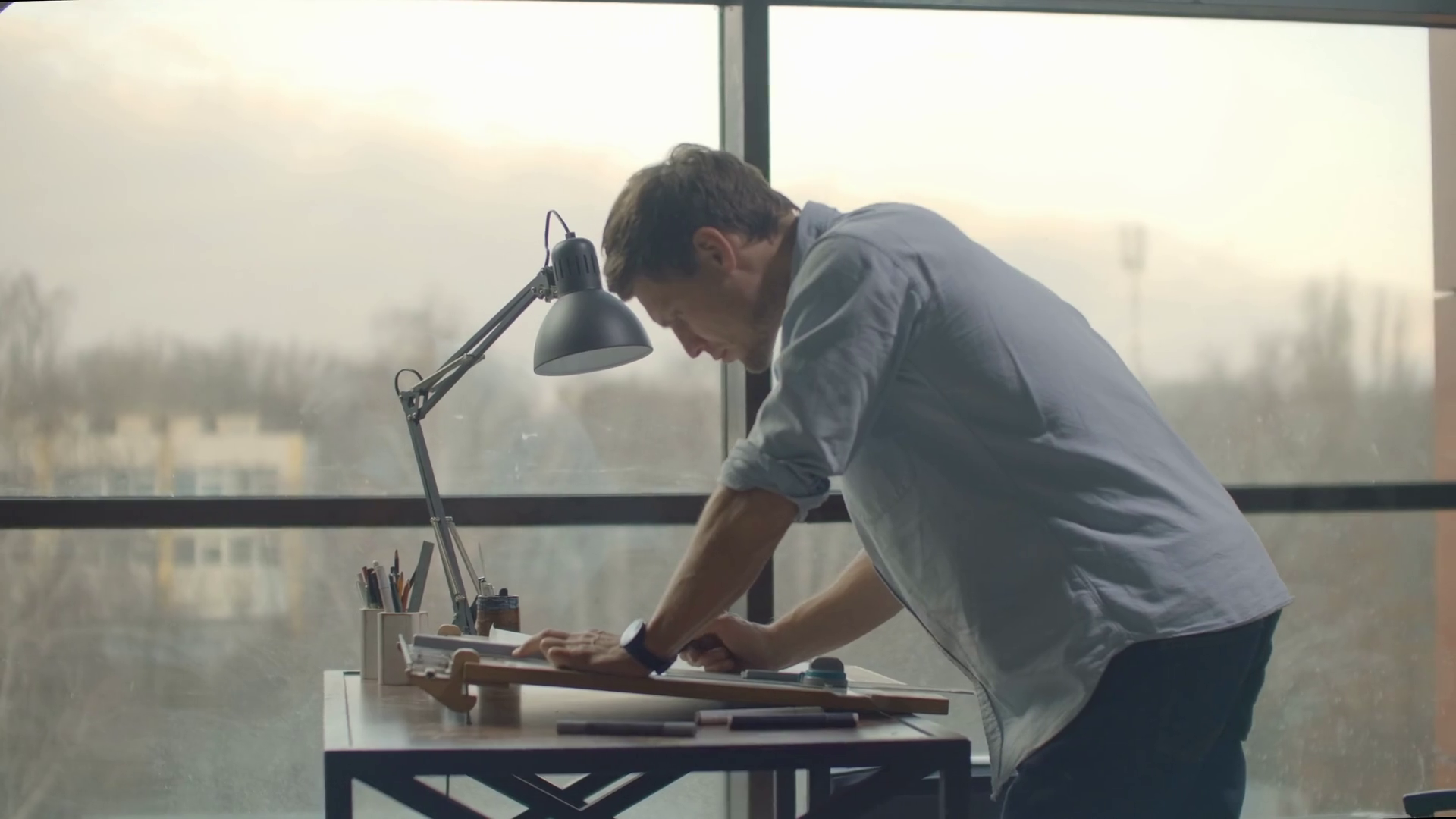 Architect Man Sits At Drafting Table In Stock Footage SBV-346534138 ...
