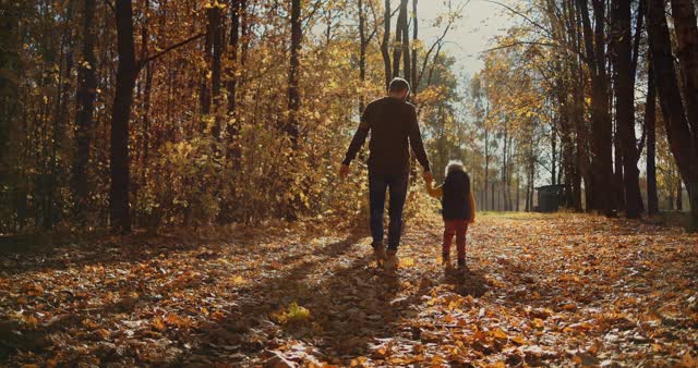 Man Walking With Am Little Girl In Woods Stock Footage: Royalty-Free ...