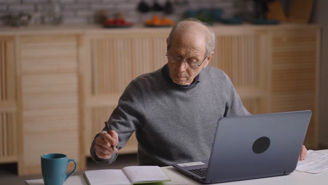 Old Man Writing A Book Stock Footage: Royalty-Free Video Clips ...
