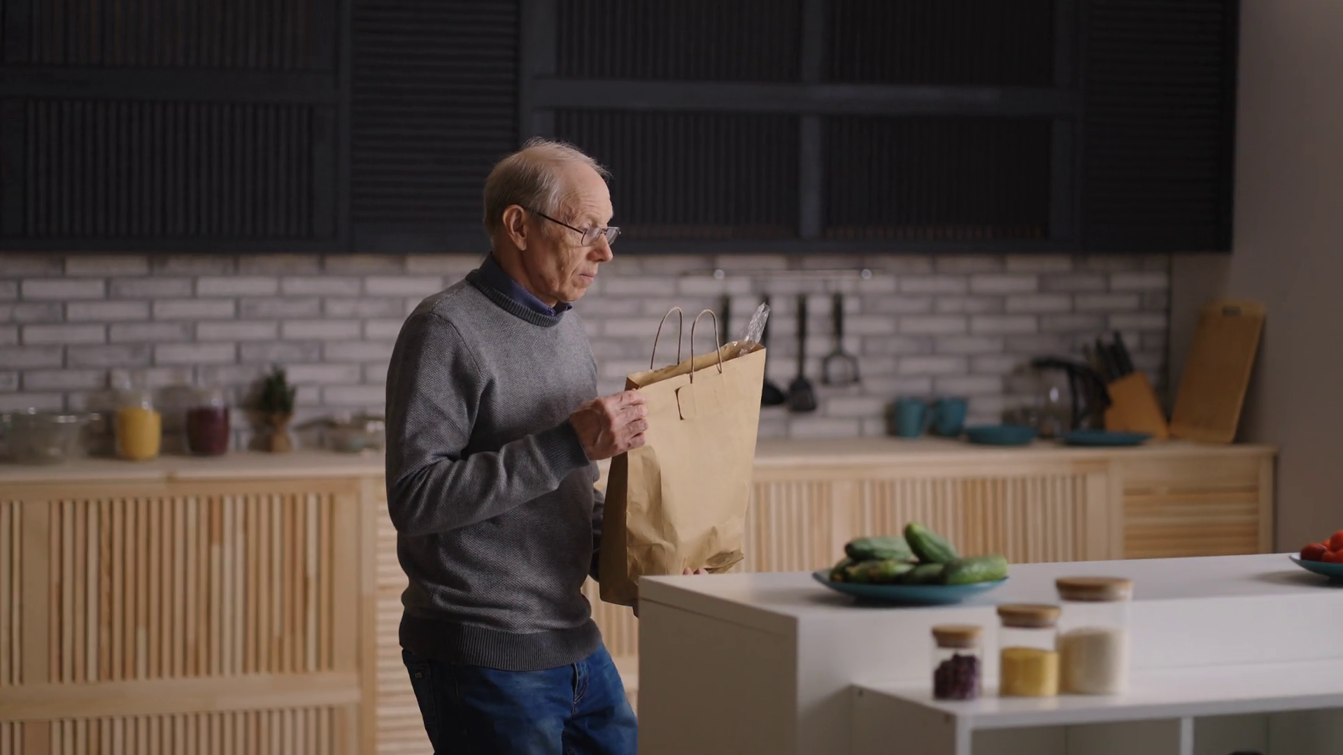 Single Old Man Is Unpacking Food Shopping In Stock Footage SBV ...