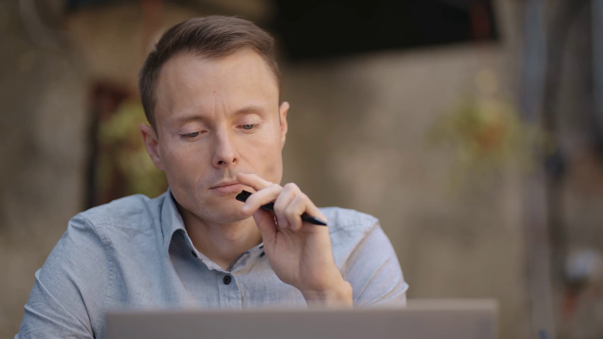 Thoughtful 30s man thinking of problem solution working on laptop ...