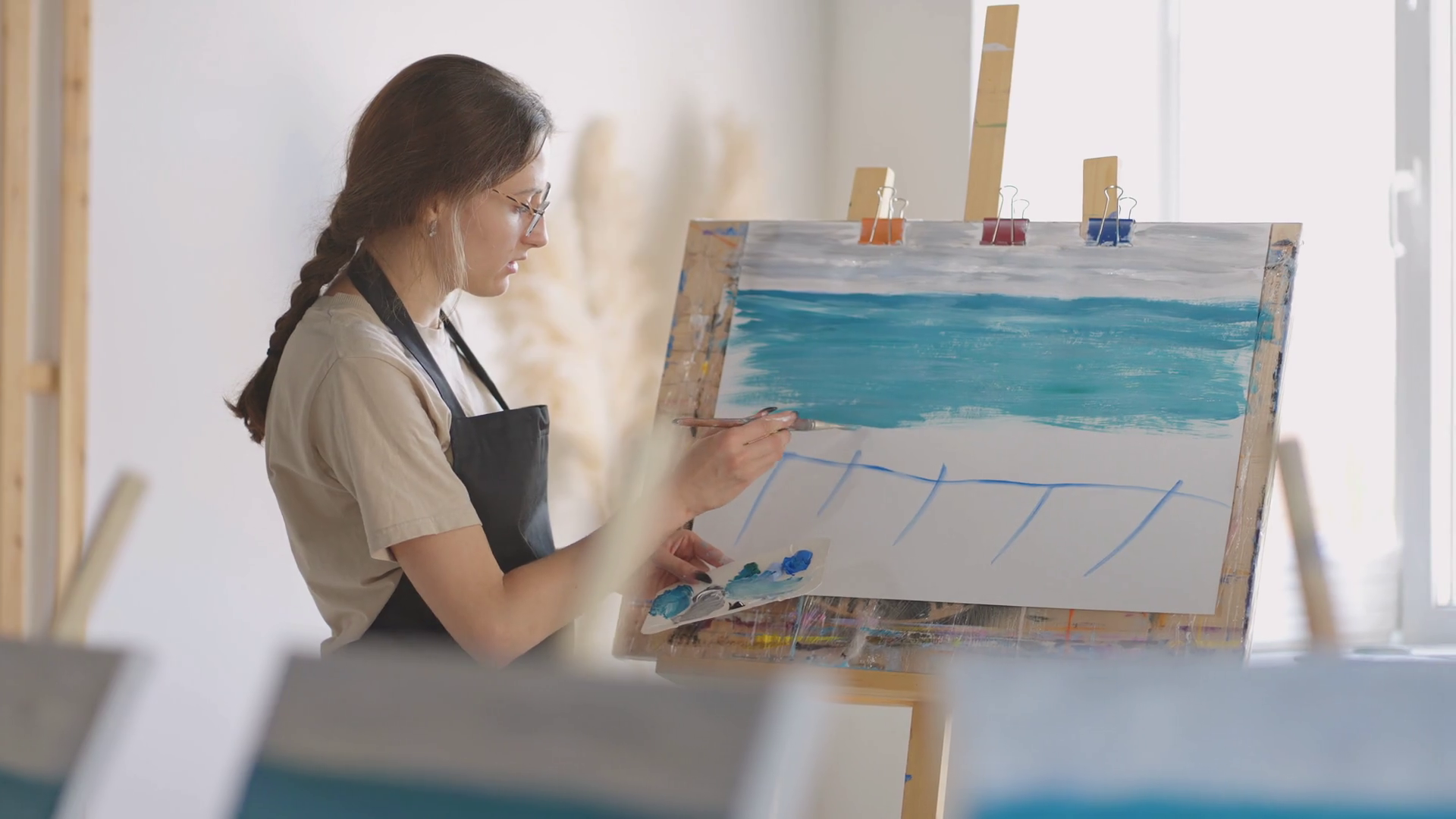 Young Woman Teacher Explains To Draw Picture Stock Footage SBV ...