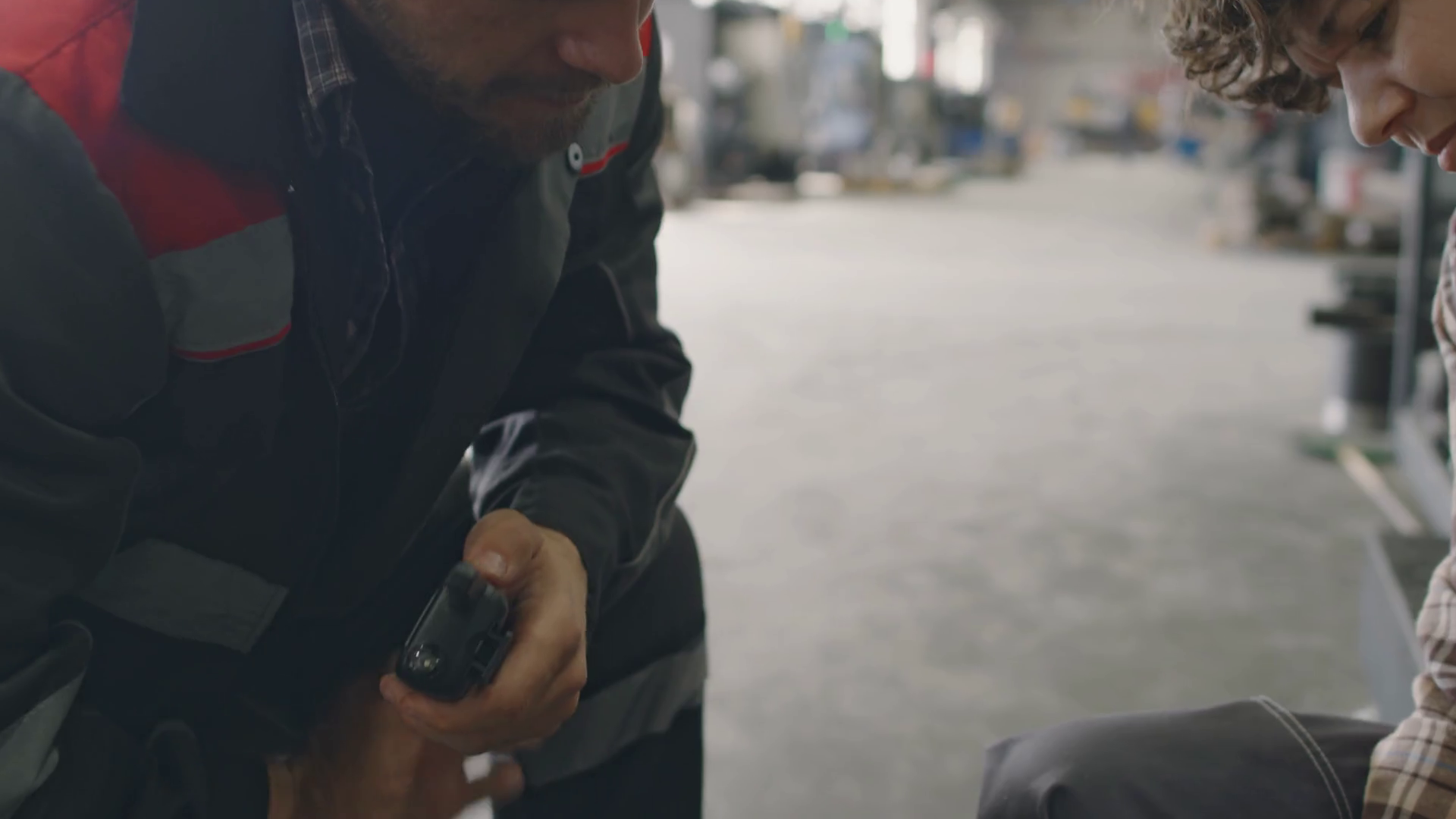 Factory Worker Helping Female Colleague With Stock Footage SBV ...