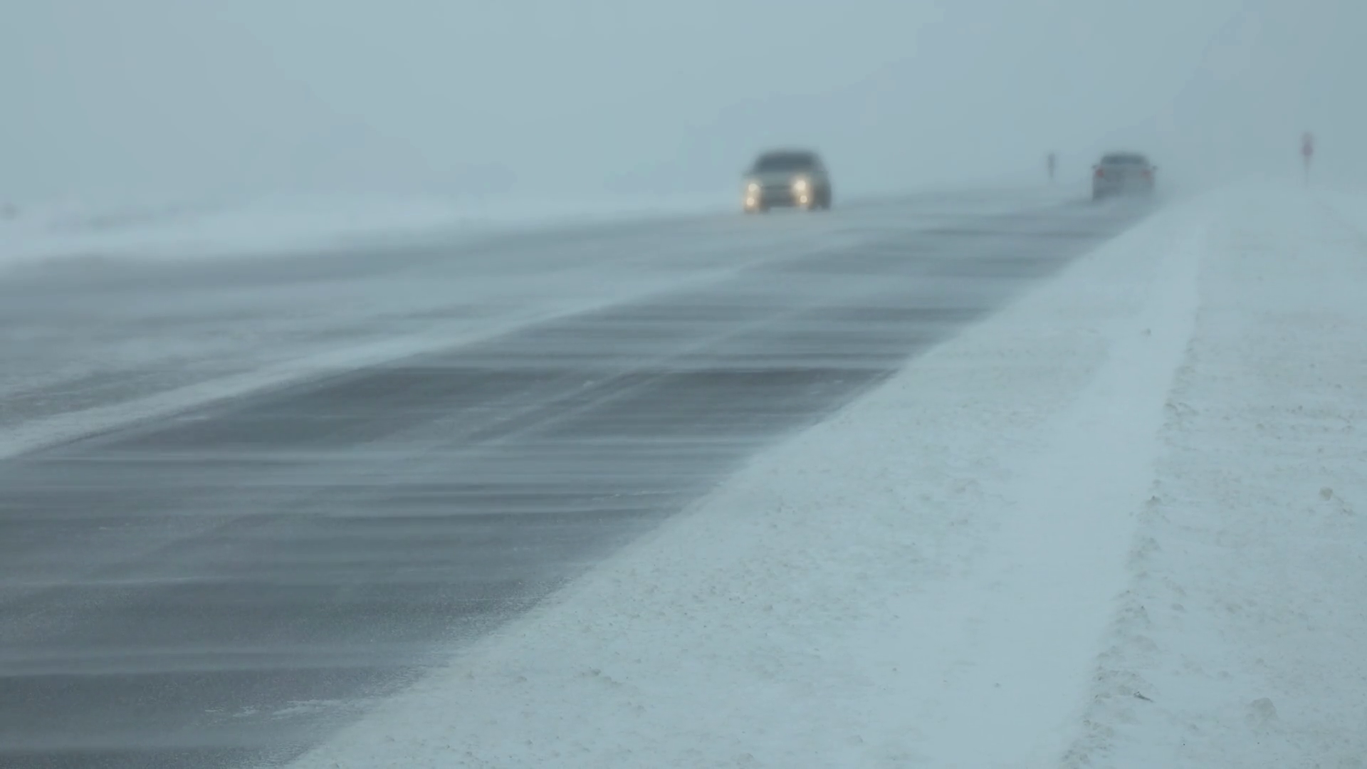 Cars On Winter Road At Blizzard Stock Footage SBV-347352311 - Storyblocks
