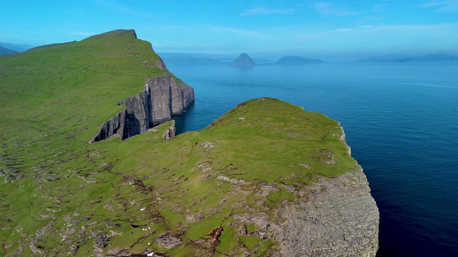 Majestic Cliffs Tower Over Calm Blue Waters Stock Footage SBV-352734532 ...